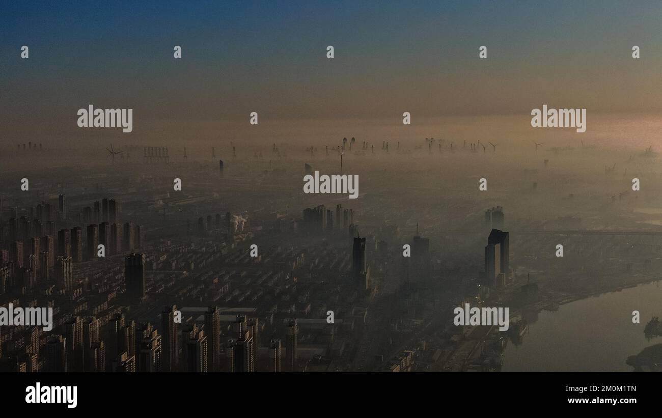 Aerial photo shows the misty scenery of the downtown of Binhai New Area ...