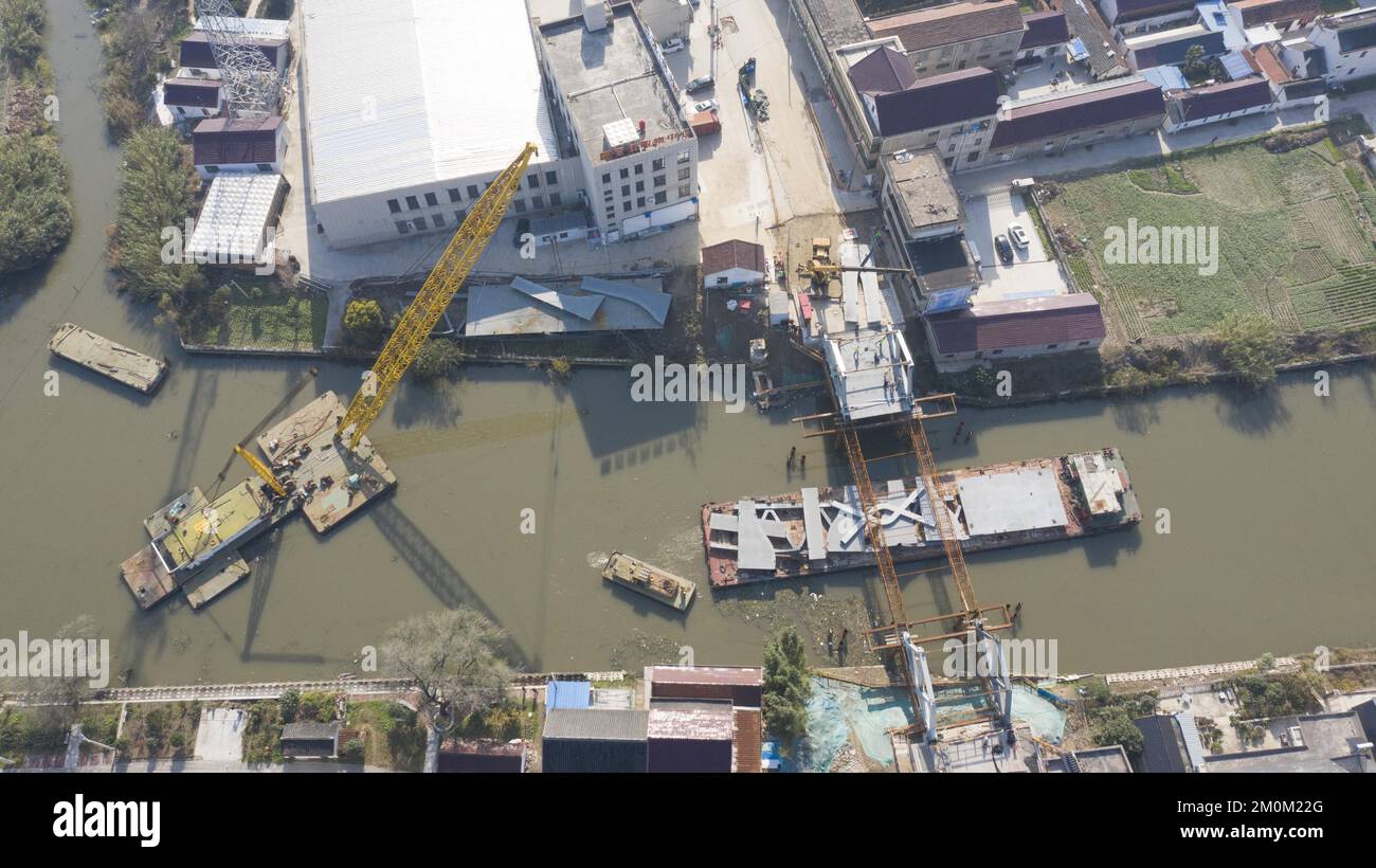 Aerial photo shows the reconstruction site of Dingsuo Bridge in Libao ...