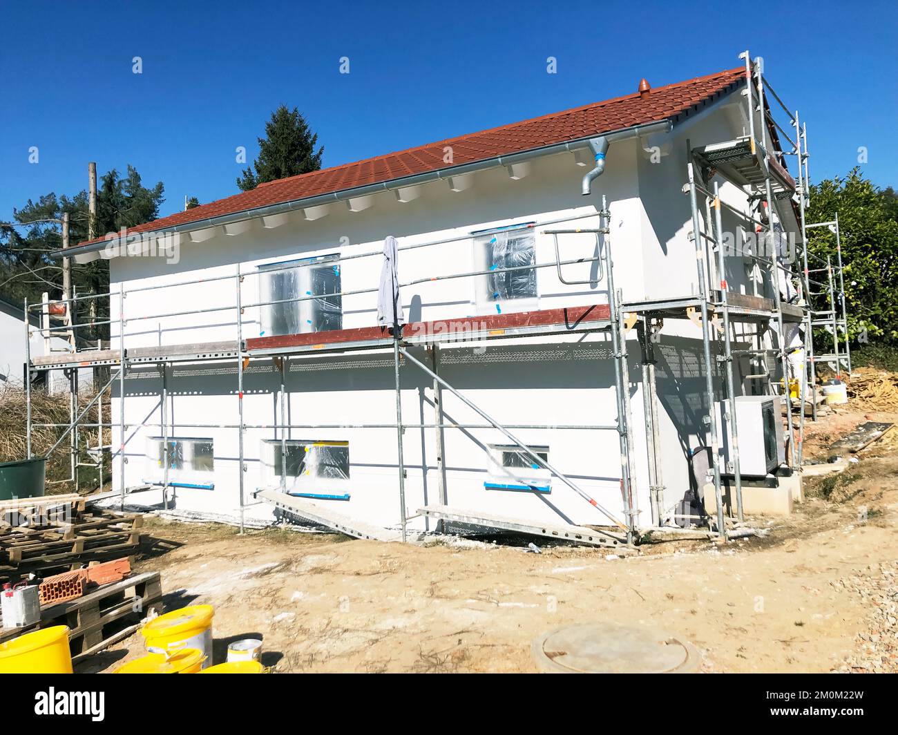 New construction site with finished base plaster Stock Photo - Alamy
