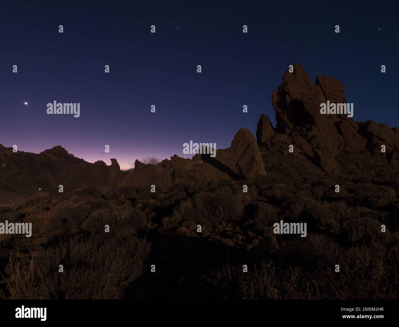 Long exposure night shot of Roques de Garcia volcanic rock formation at El Teide national park ...
