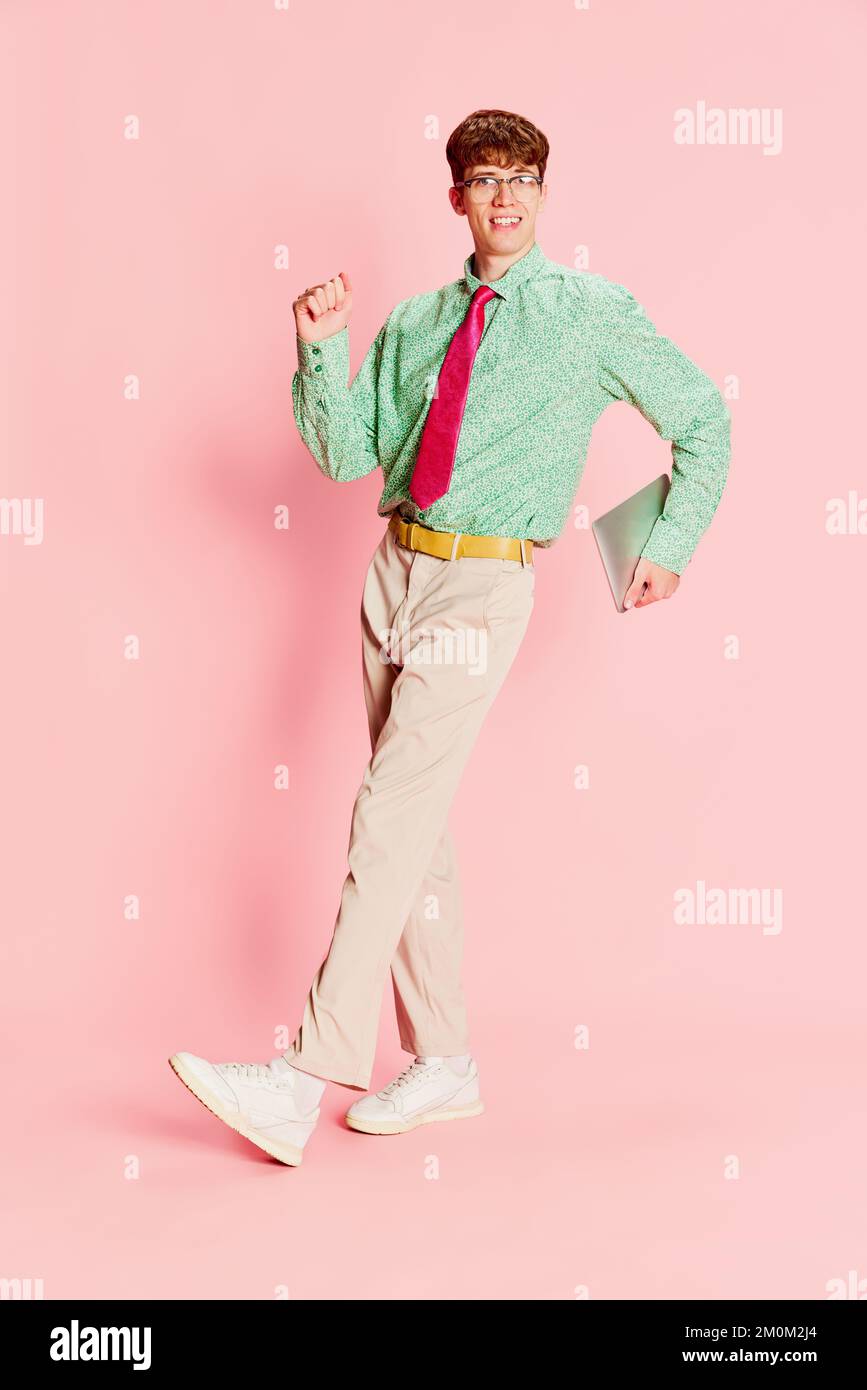 Going to study. Stylish emotional man, student geek wearing vintage ...