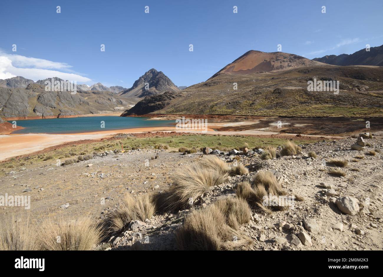 Lakes below mining waste give some dramatic colour to the mountain ...