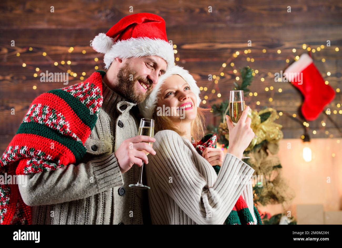 Make christmas wish. Couple in love cuddling enjoy christmas holiday ...