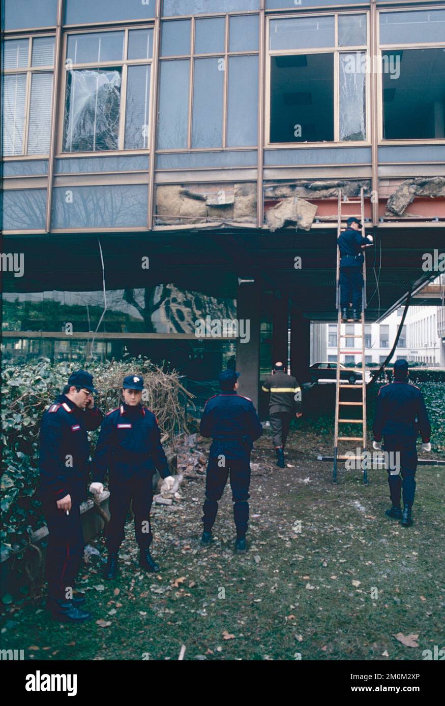 Policemen at the site of the bombing attack to NATO Offices in Rome ...