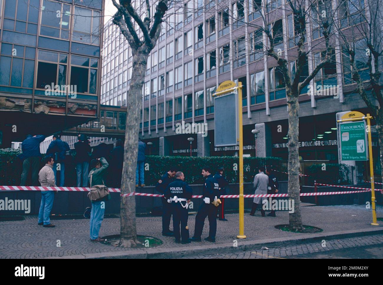 Policemen at the site of the bombing attack to NATO Offices in Rome ...