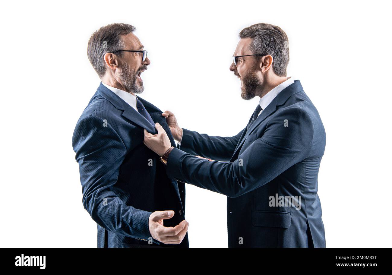 aggressive businessmen fighting in studio. fighting businessmen ...