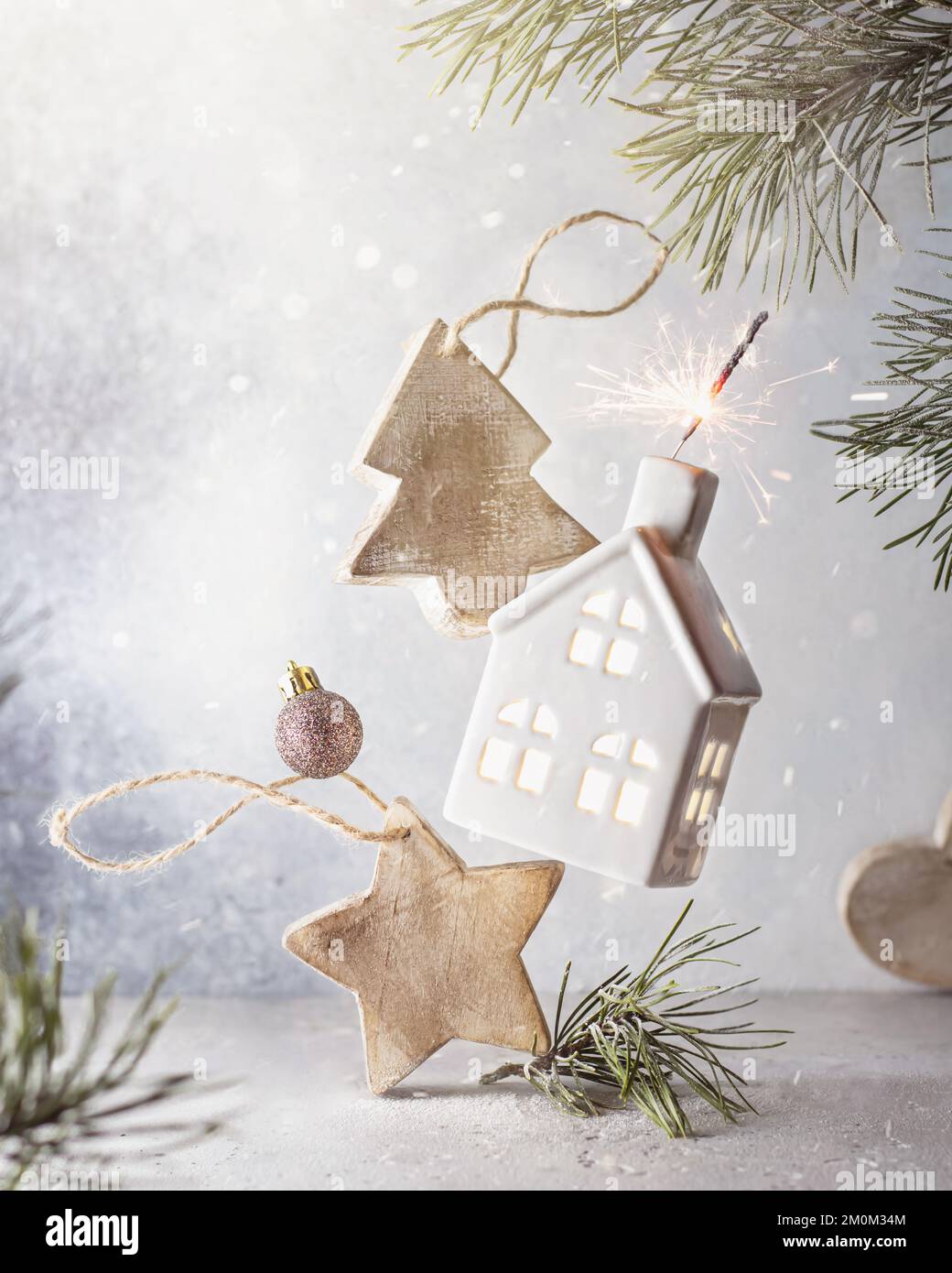 Balancing Xmas composition of christmas decorartion with sparkler ...
