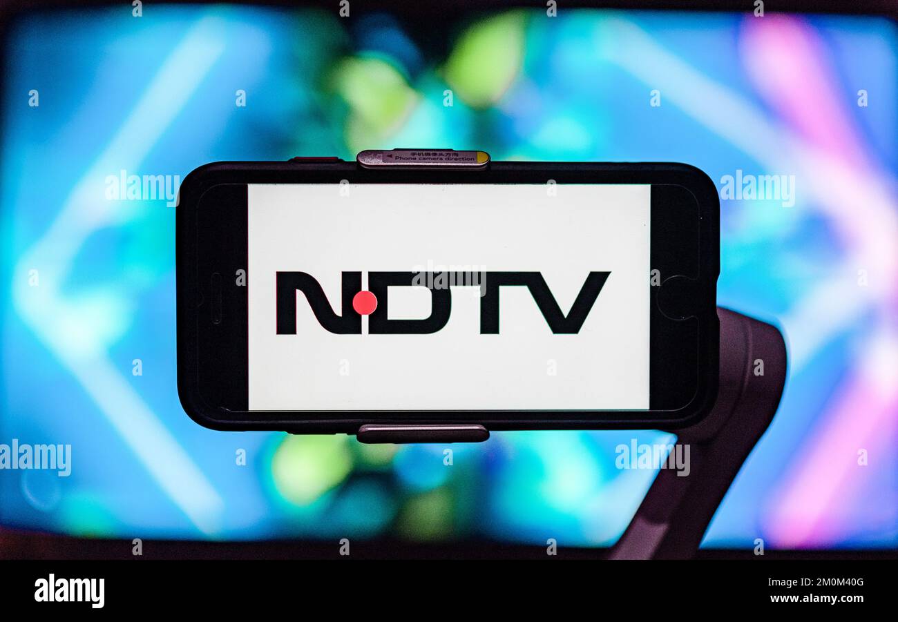 In this photo illustration, the Indian media news company logo, NDTV is ...
