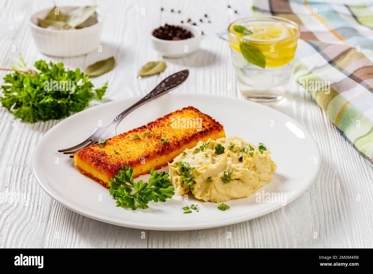 Baccala mantecato, creamed salt cod pate with toasted polenta on white ...