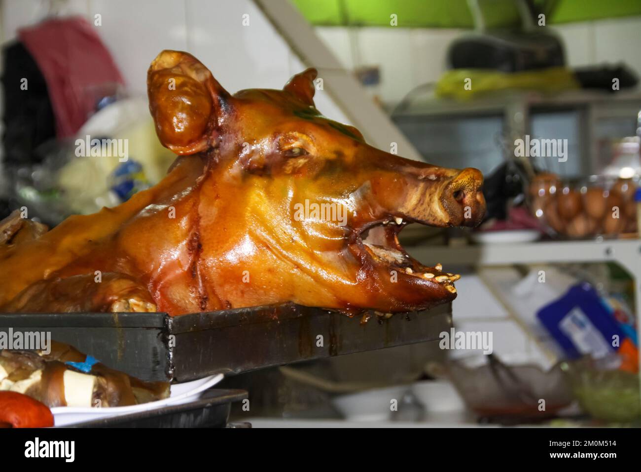 Street food at Banos, Ecuador whole grilled pig ready to be eaten Stock ...