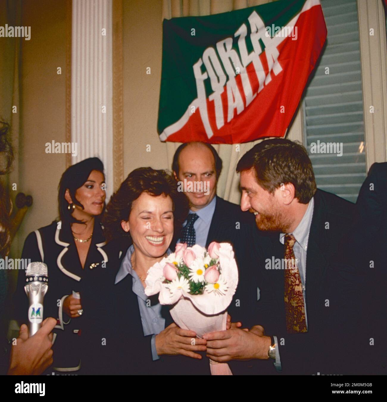 Italian politician Tiziana Parenti receiving flowers at the opening of ...
