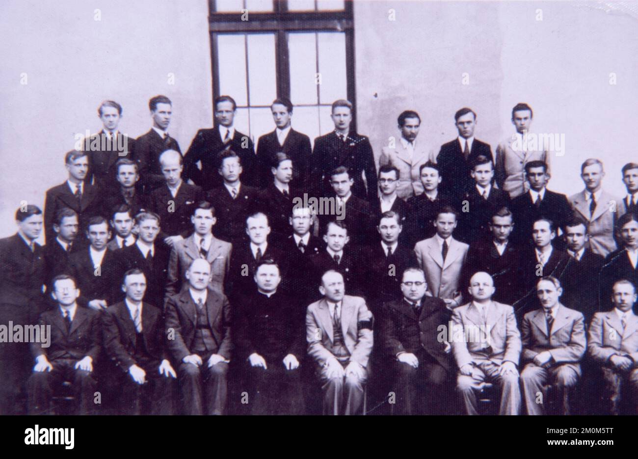 Class photo of young men with the teachers, Poland 1930s Stock Photo ...