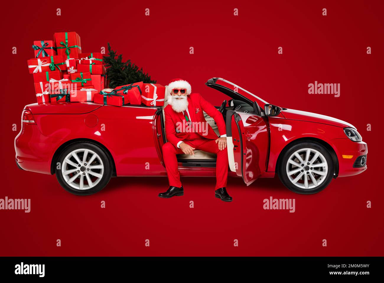 Photo of confident granddad sit automobile posing deliver present gifts ...