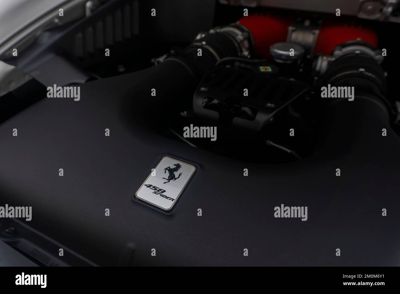 A closeup shot of details on the Ferrari 458 Spider engine bay model ...
