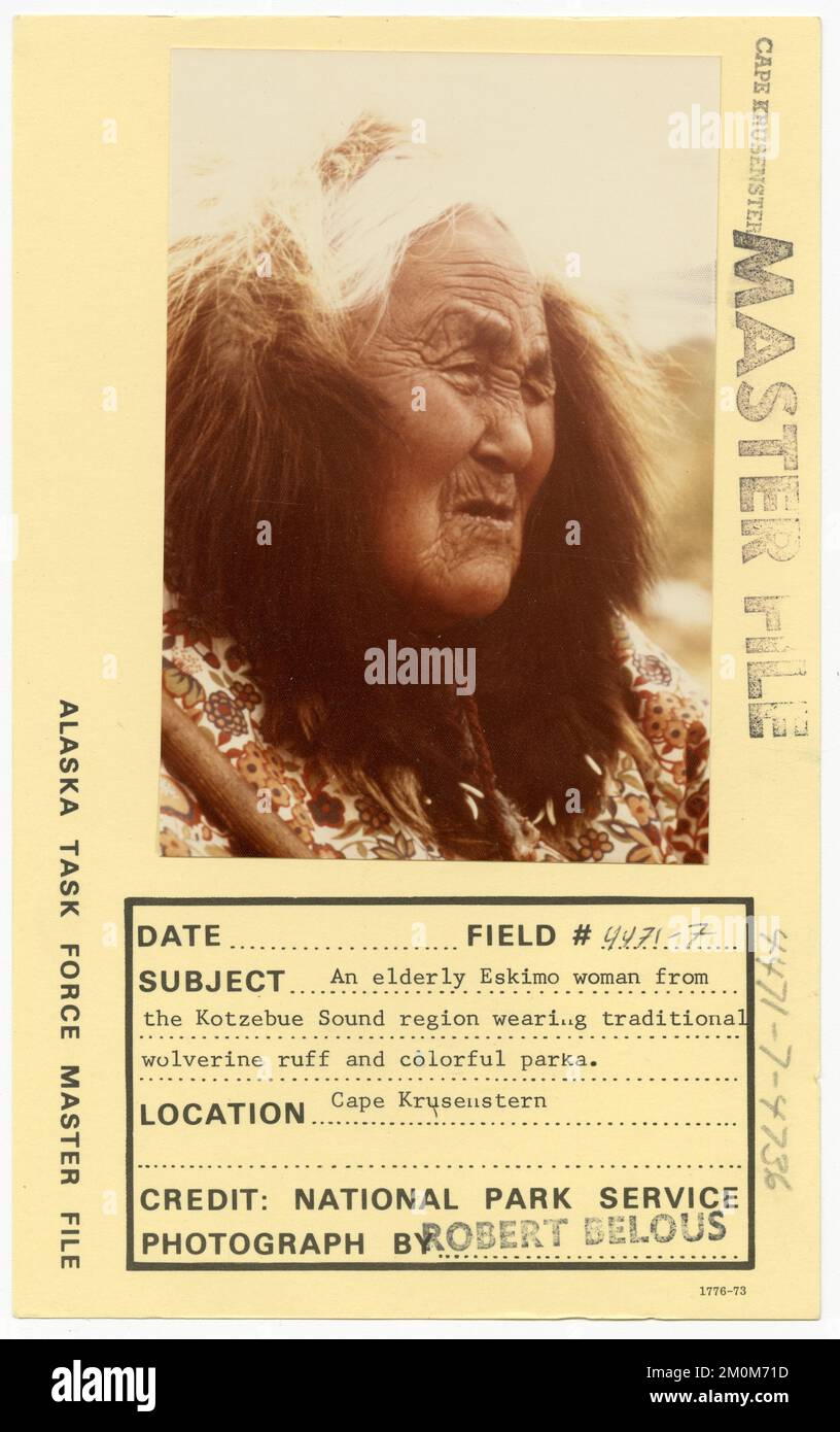 An elderly Eskimo woman from the Kotzebue Sound region wearing ...