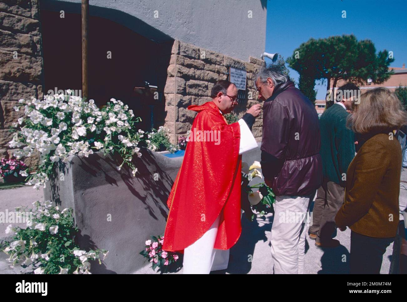 Catholic priest Don Pablo Martin celebrating Palm Sunday, Civitavecchia ...