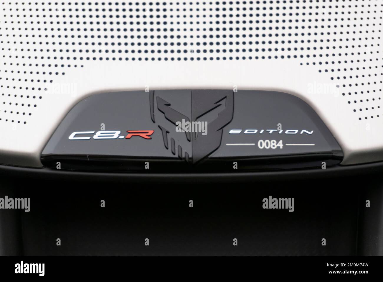A closeup of the Corvette C8-R Edition limited number badge between ...
