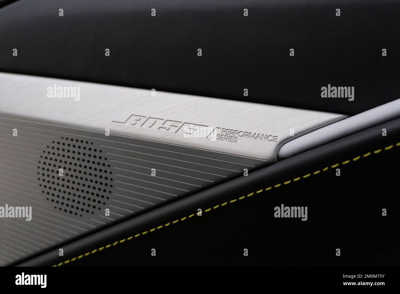 A closeup of the Corvette C8-R Edition BOSE performance series premium ...