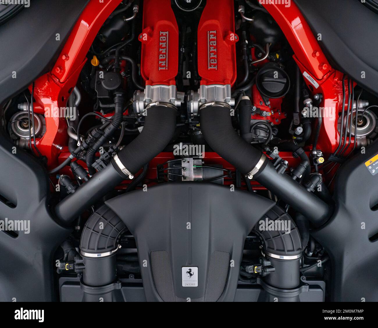 A closeup shot of details on a Ferrari Portofino engine bay Stock Photo ...
