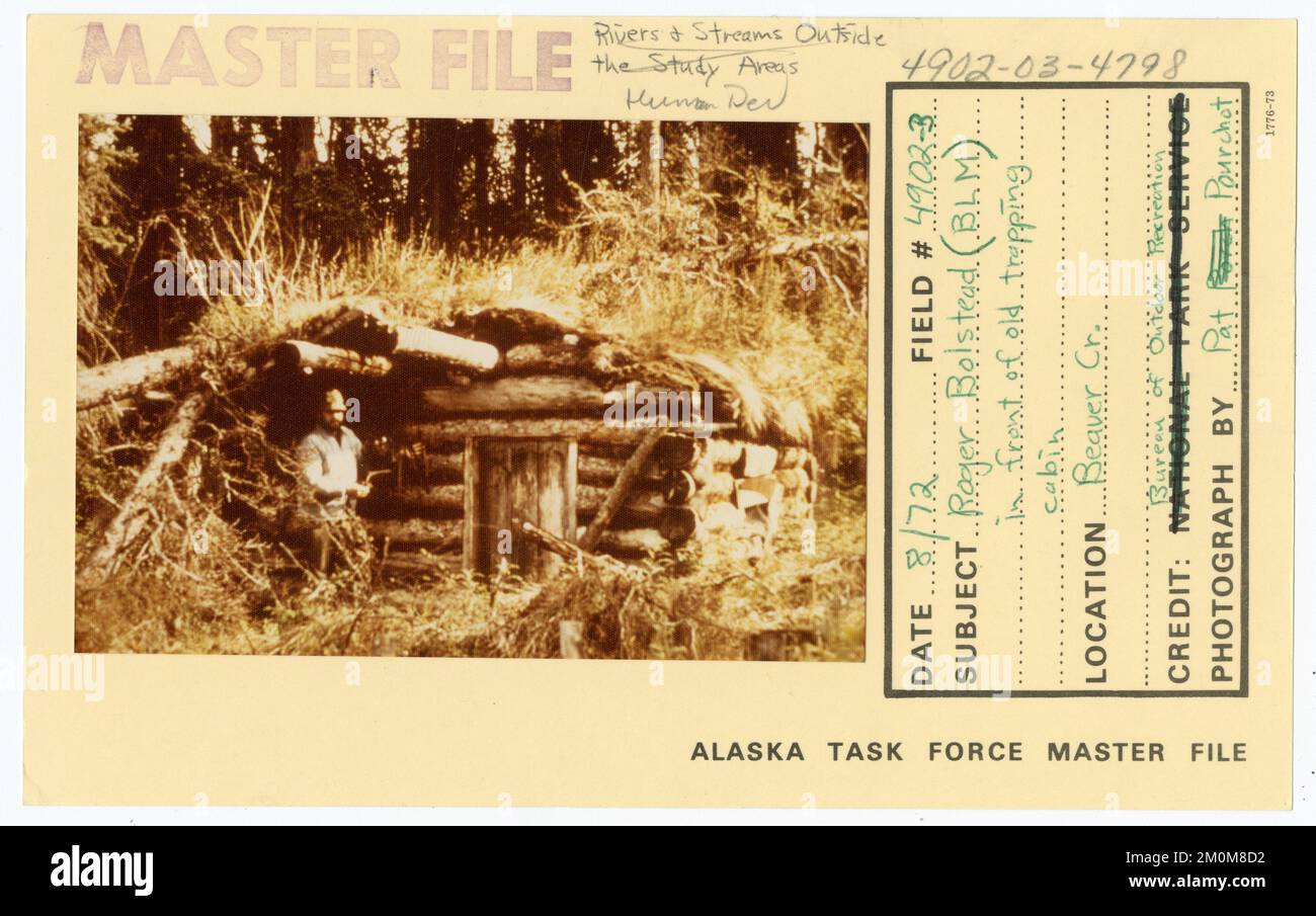 Roger Bolstead (BLM) in front of old trapping cabin. Alaska Task Force ...