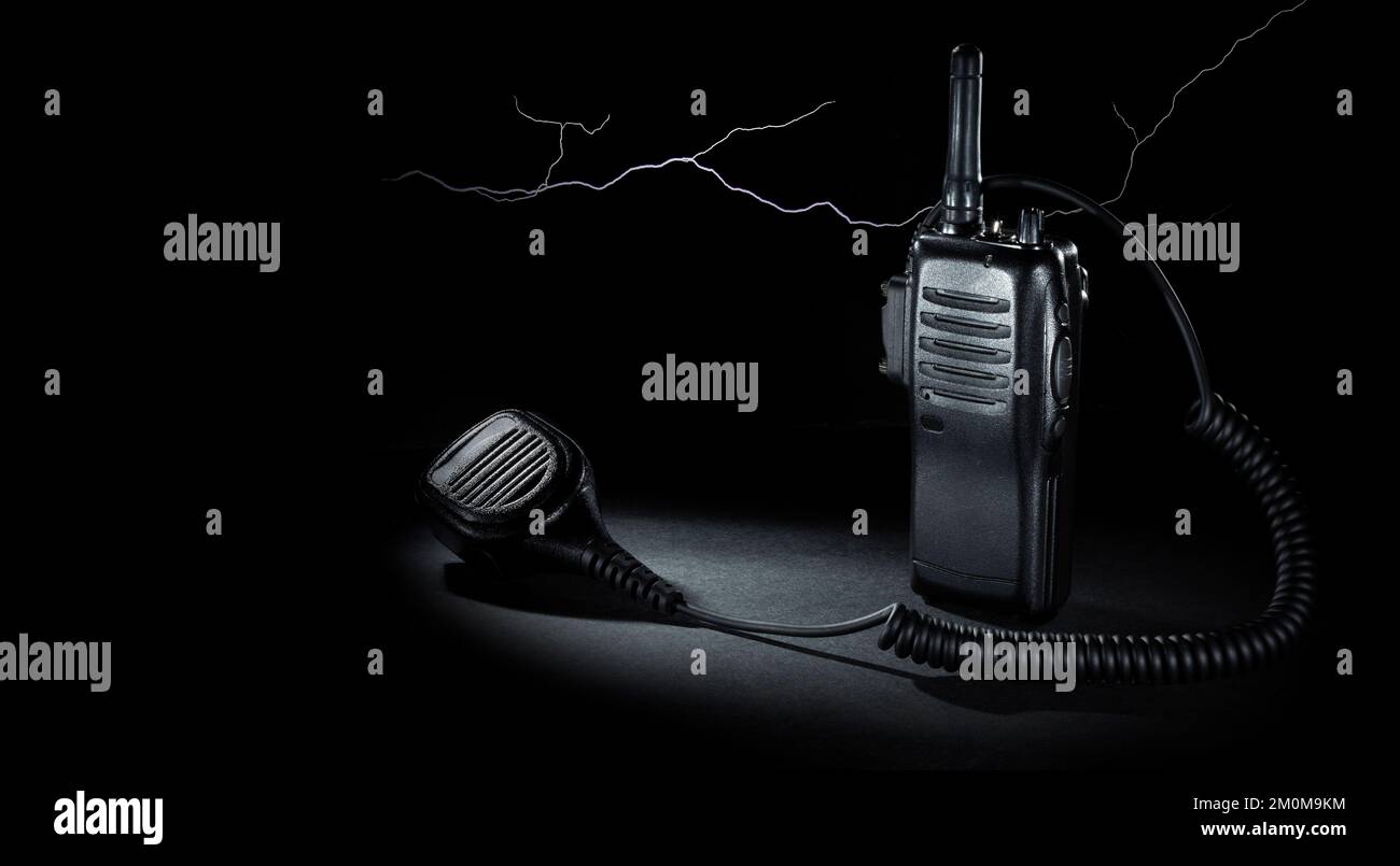 Two way radio and micropohone with copy space and lightning Stock Photo ...