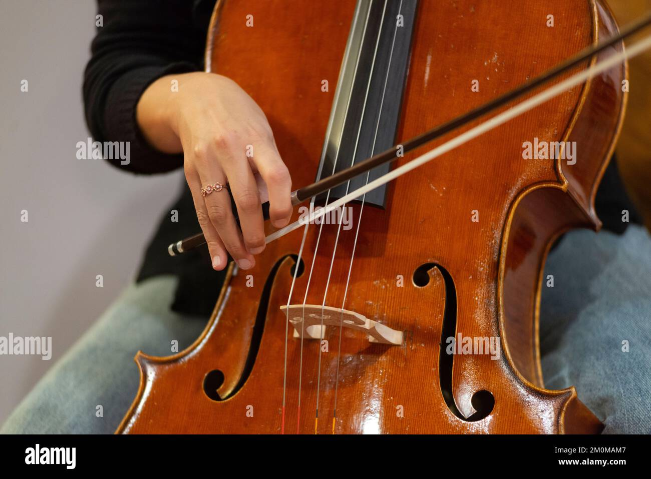 Hand detail playing wooden hi-res stock photography and images - Alamy