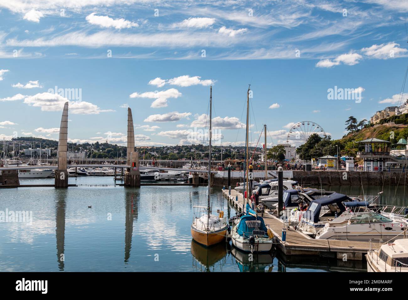 A view across Torquay Harbour to The Millennium Bridge and English ...