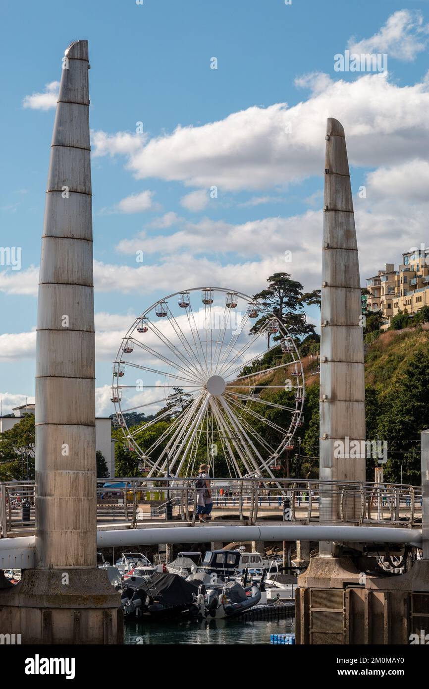A view of the English Riviera Wheel through the pillars of The ...