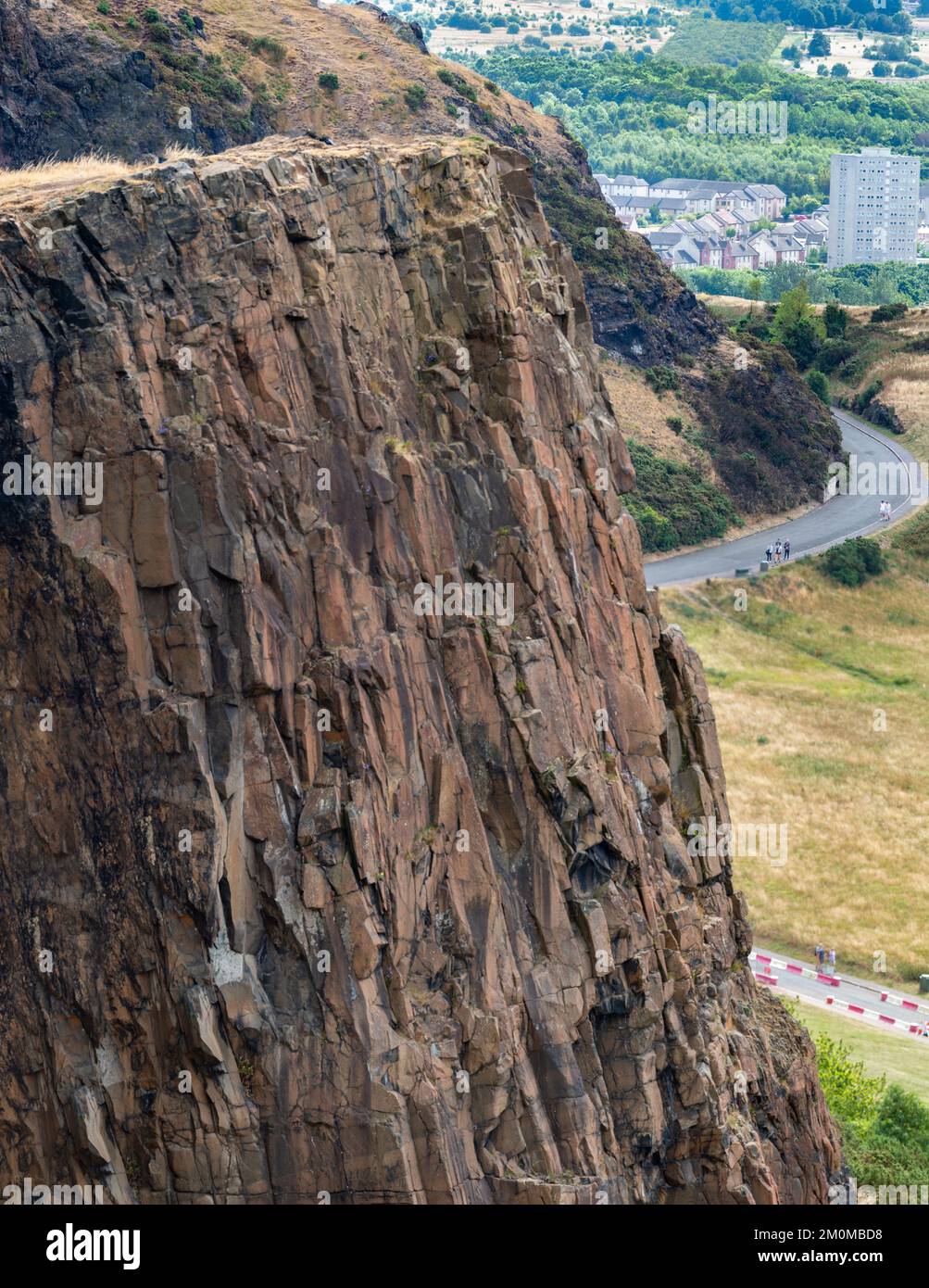 Looking down to pathways of Holyrood Park far below.narrow paths across ...