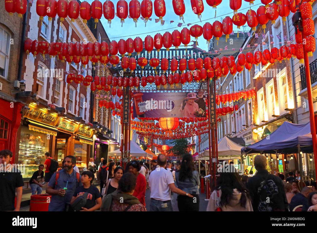 Queen Elizabeth's II platinum Jubilee , Chinese arch, Chinatown SOHO London at dusk, England, UK ...