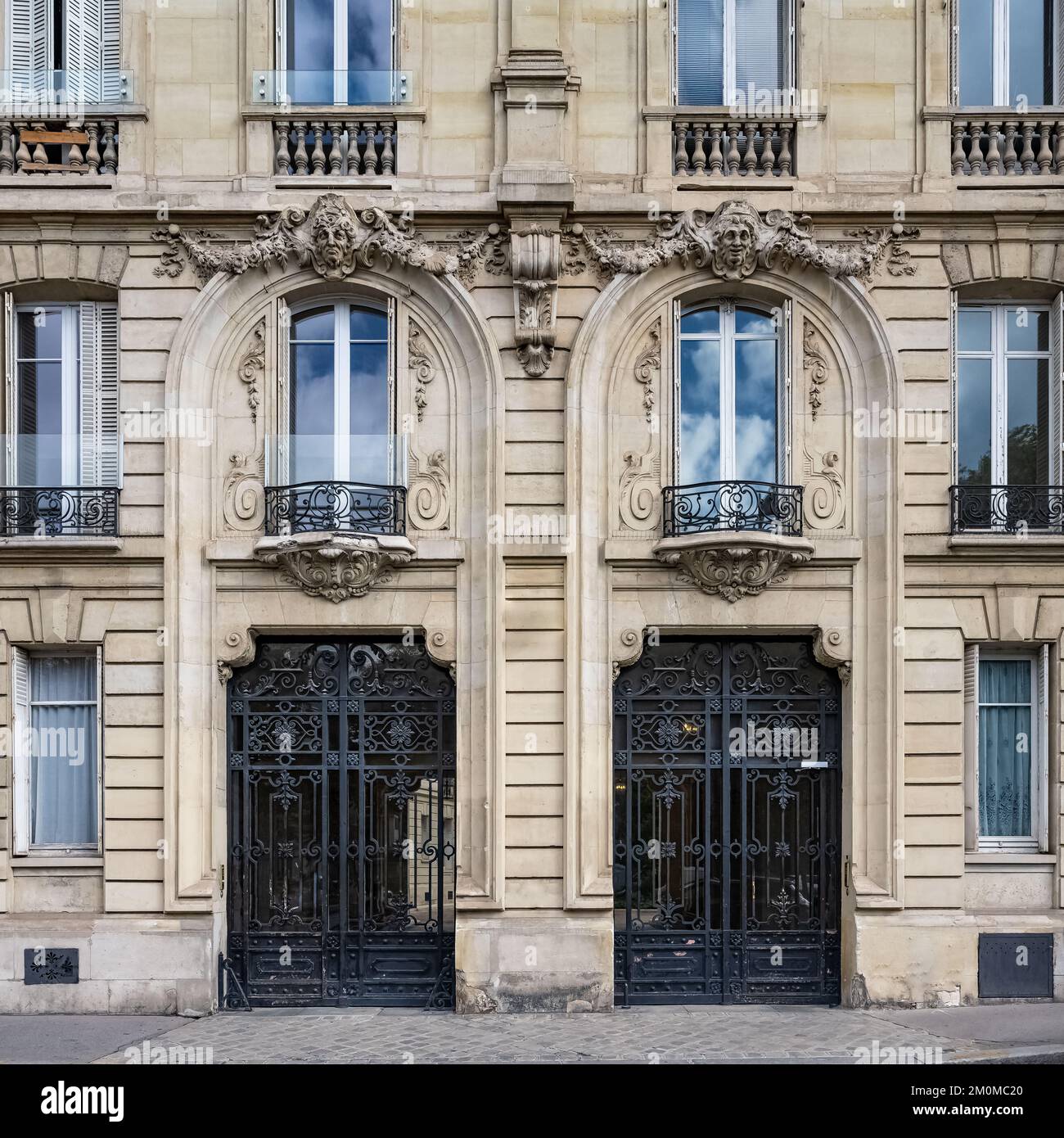 Paris, two ancient wooden doors, beautiful facade rue Saint-Dominique ...