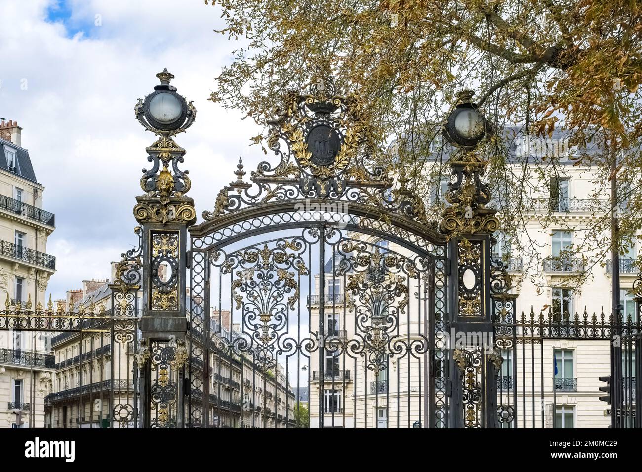 Paris, in the beautiful parc Monceau, the golden wrought iron grid ...