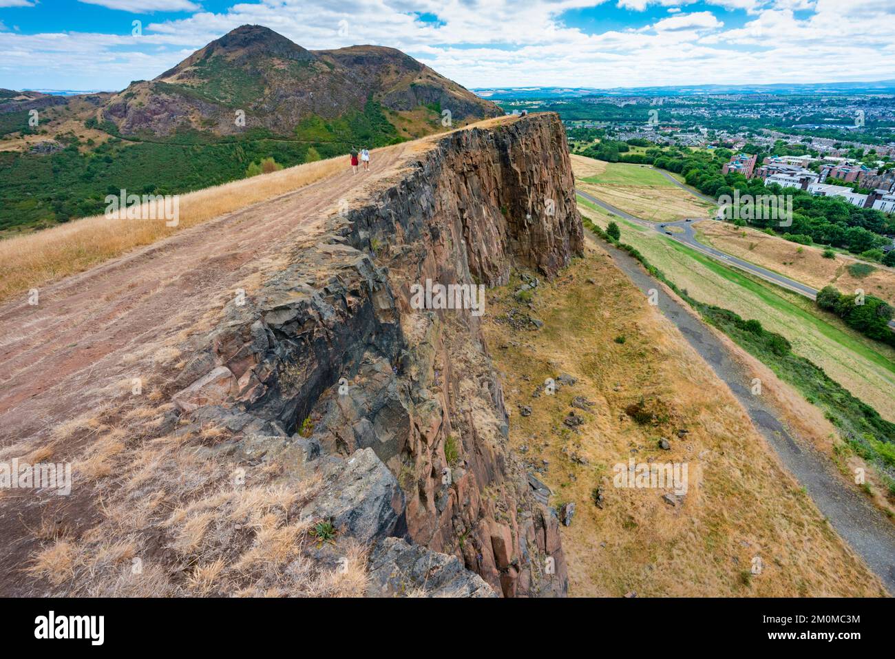 Climbing up to the top of the mountain overlooking Holyrood Park ...