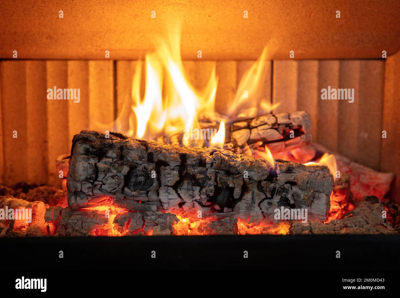 Fireplace close up, fire flame and burning wood logs, warm home in ...