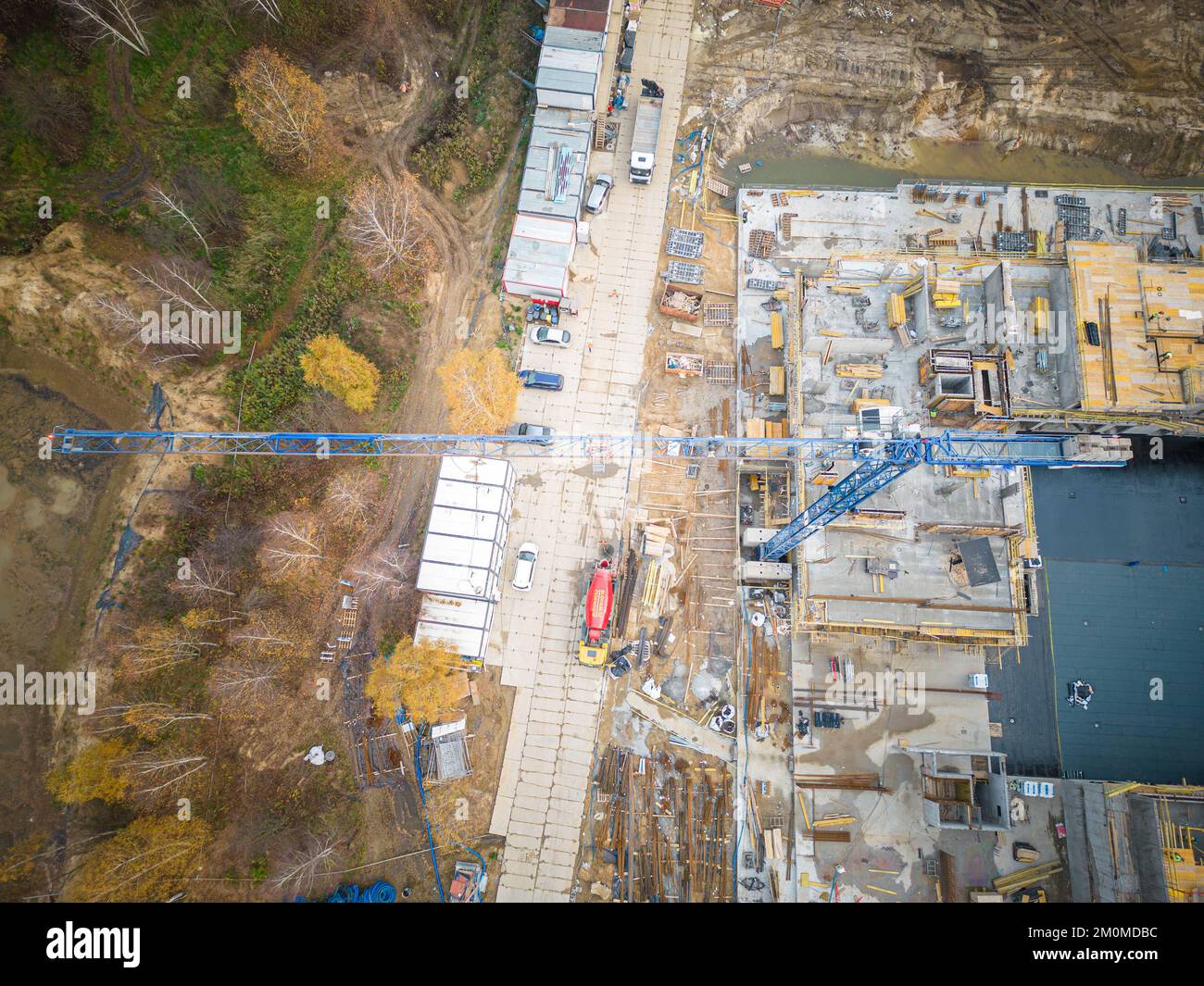 Aerial Flight Over a New Constructions Development Site with High Tower ...