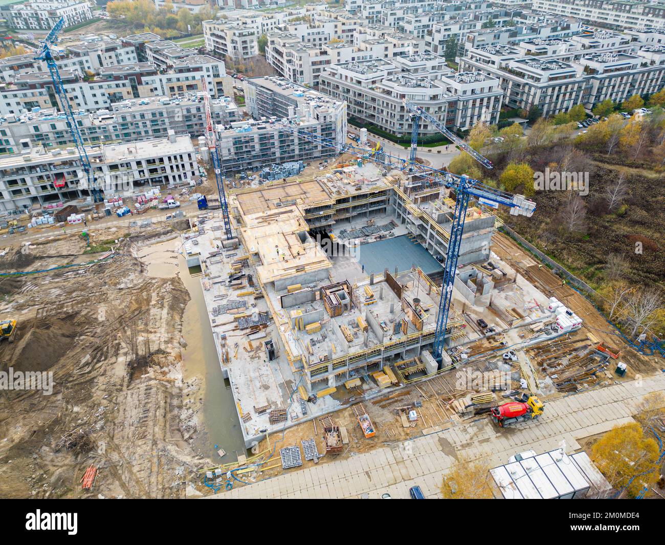 Aerial view of construction site with crane and building. Top view of ...
