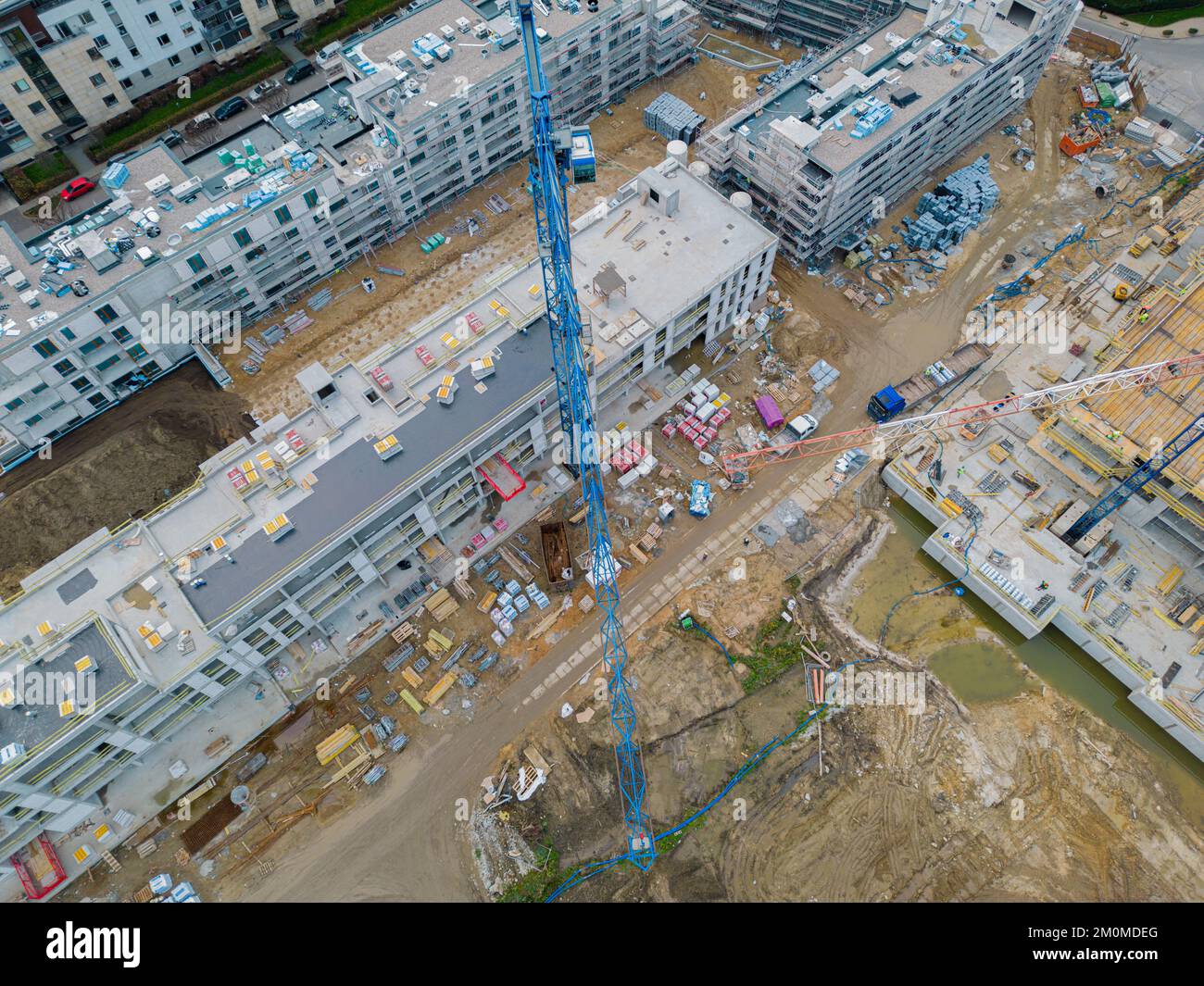 Aerial view of construction site with crane and building. Top view of ...