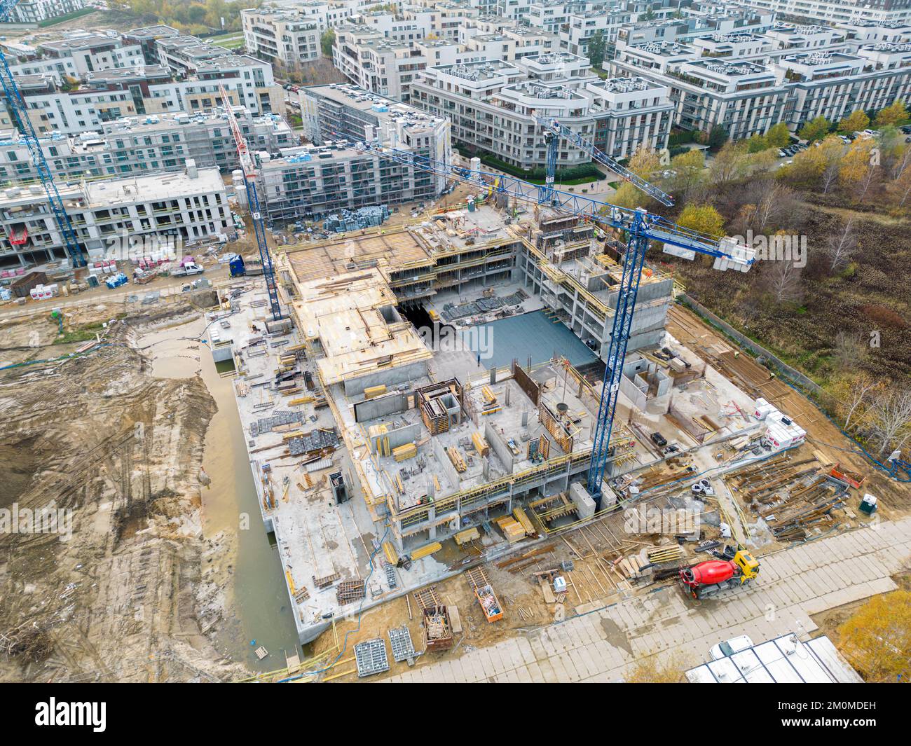 Aerial view of construction site with crane and building. Top view of ...