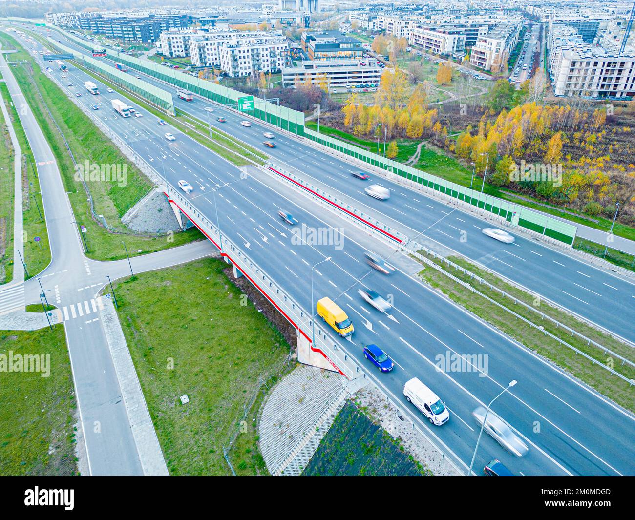 Aerial top view of bridge road automobile traffic of many cars ...