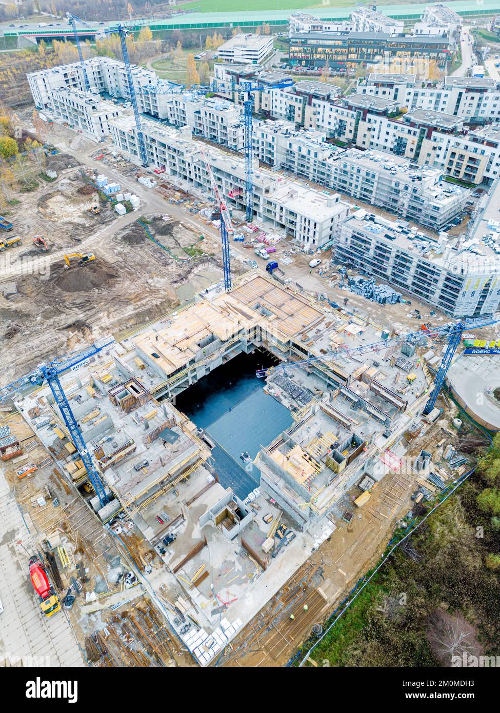 Aerial view of construction site with crane and building. Top view of ...
