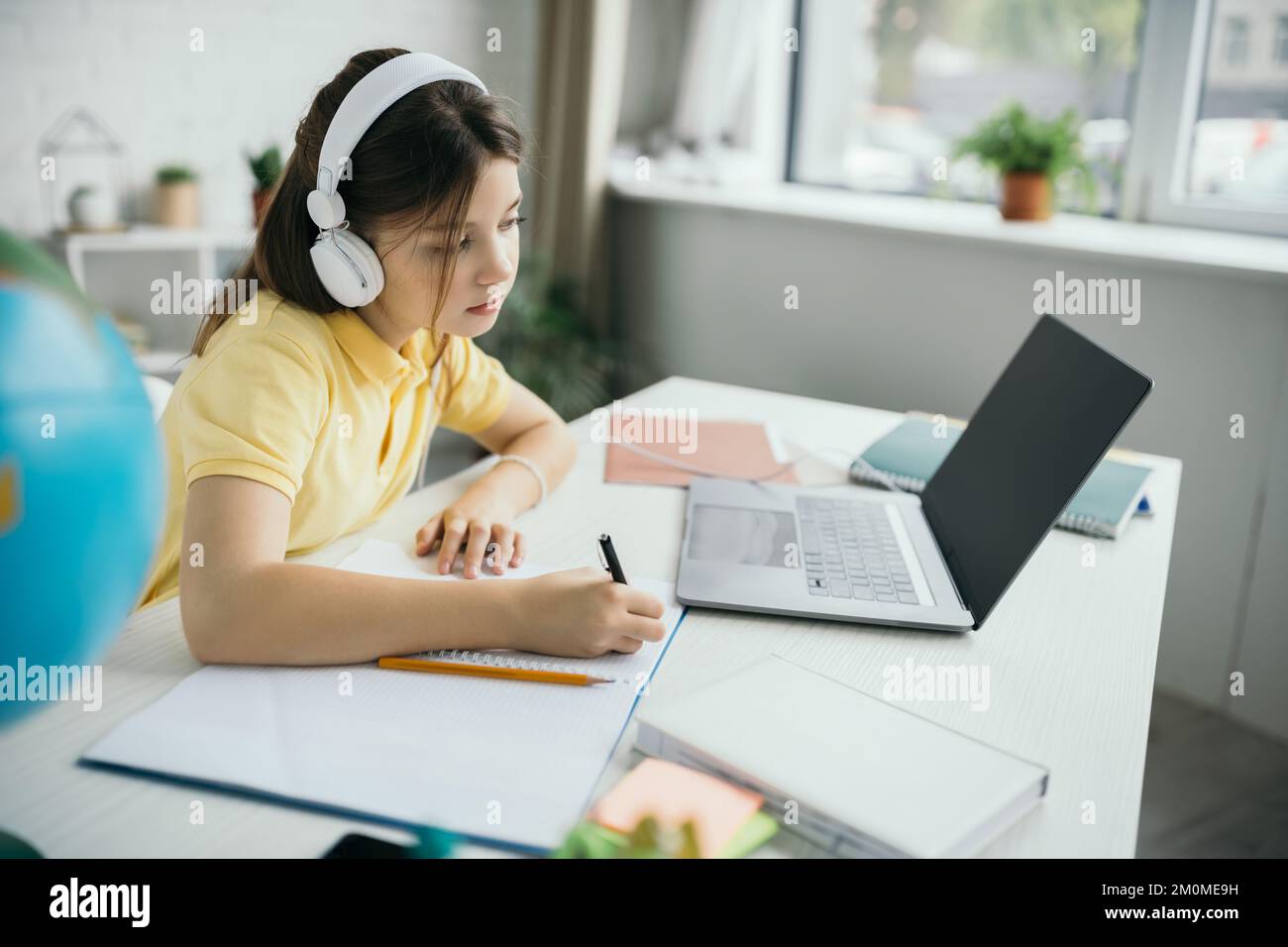 Child write laptop hi-res stock photography and images - Alamy