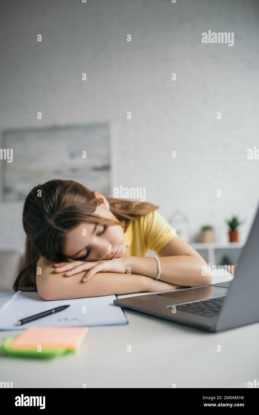 Cute child sleeping on laptop hi-res stock photography and images - Alamy