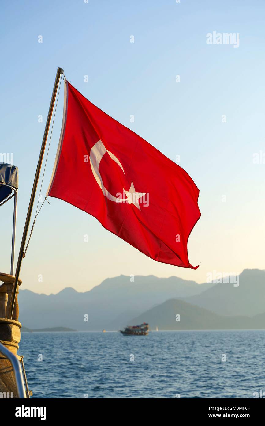 Turkish flag background. Red textile flag of Turkey on the streets of ...