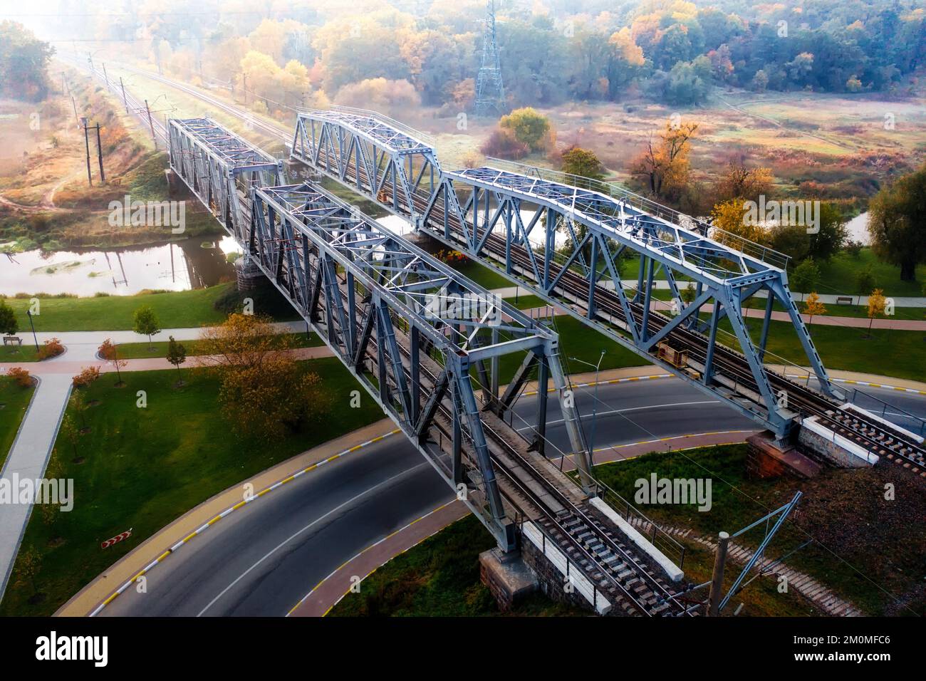 Metal double railway bridge. Freight and passenger transportation by ...