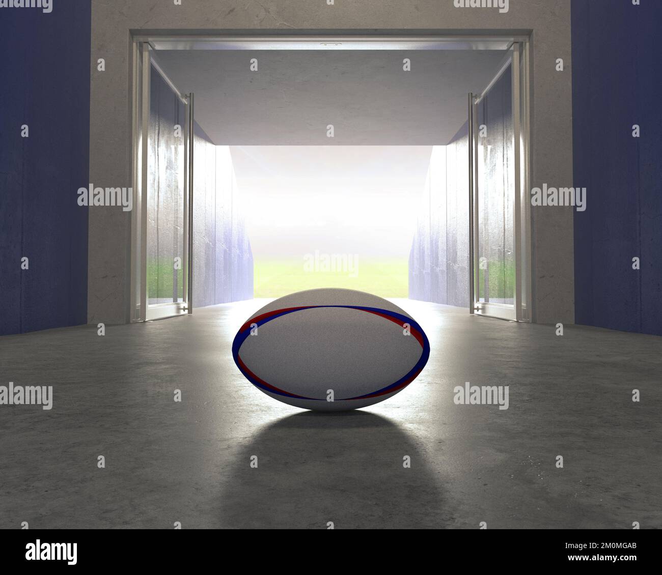 A rugby ball on the floor in a stadium sports corridor with open glass ...