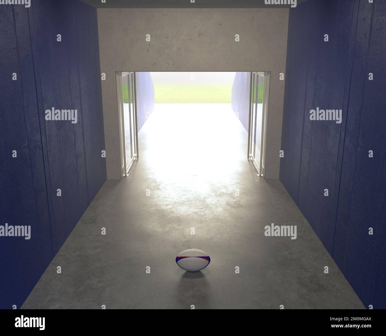 A rugby ball on the floor in a stadium sports corridor with open glass ...