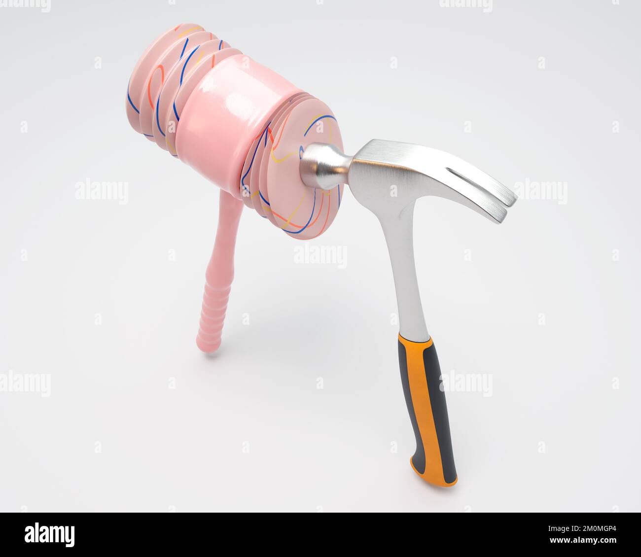 A concept showing a plastic childrens squeaking hammer striking an ...