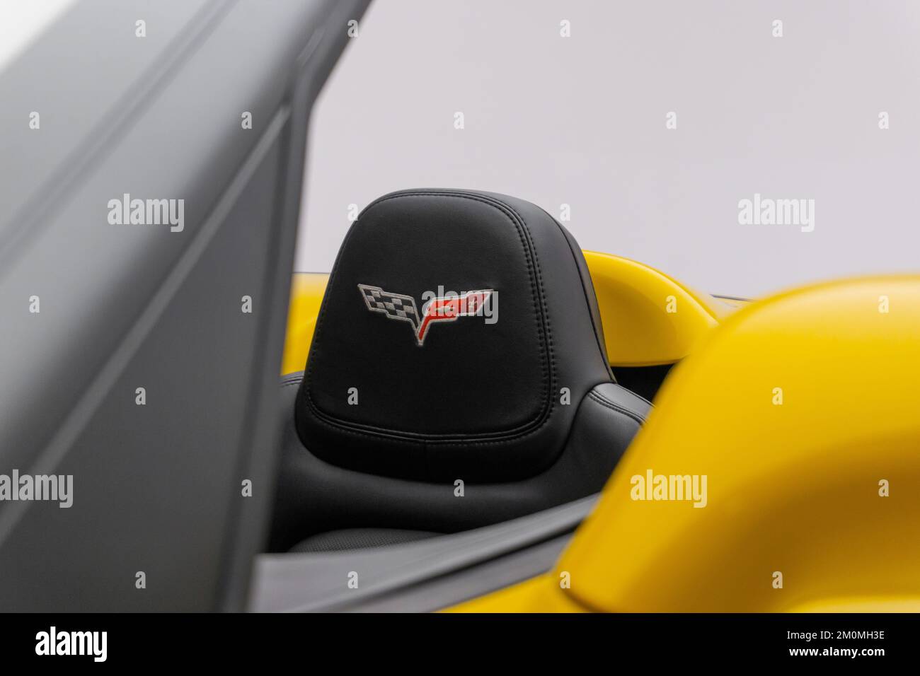 A closeup of the Corvette C6 Stingray headrest logo Stock Photo - Alamy