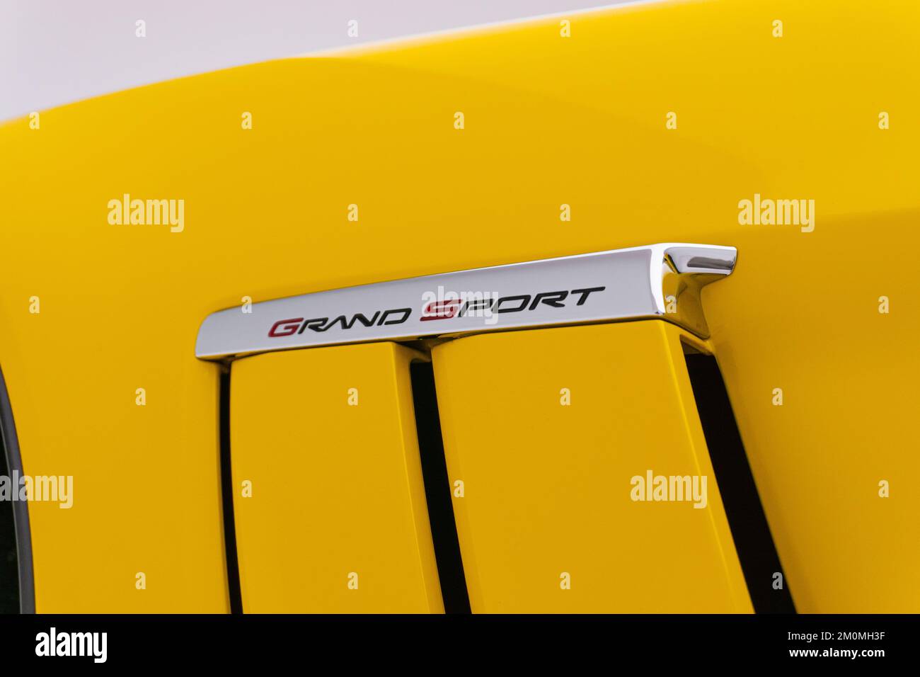 The yellow Corvette C6 Grand Sport side air outlet with the Grand Sport ...