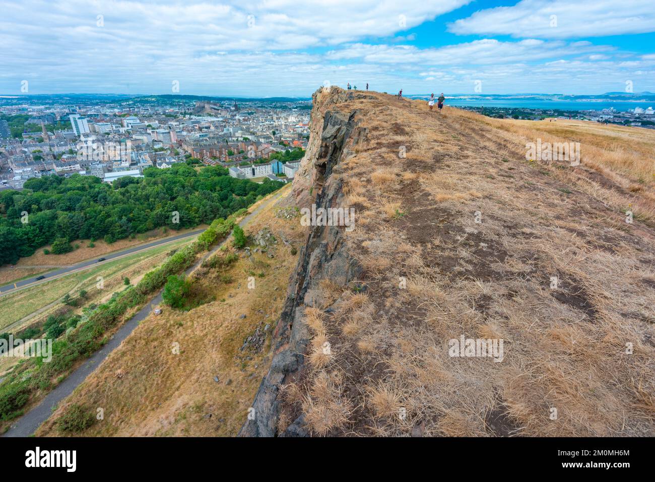 Edinburgh,Scotland-August 01 2022: Visitors climbing to Arthur's seat ...